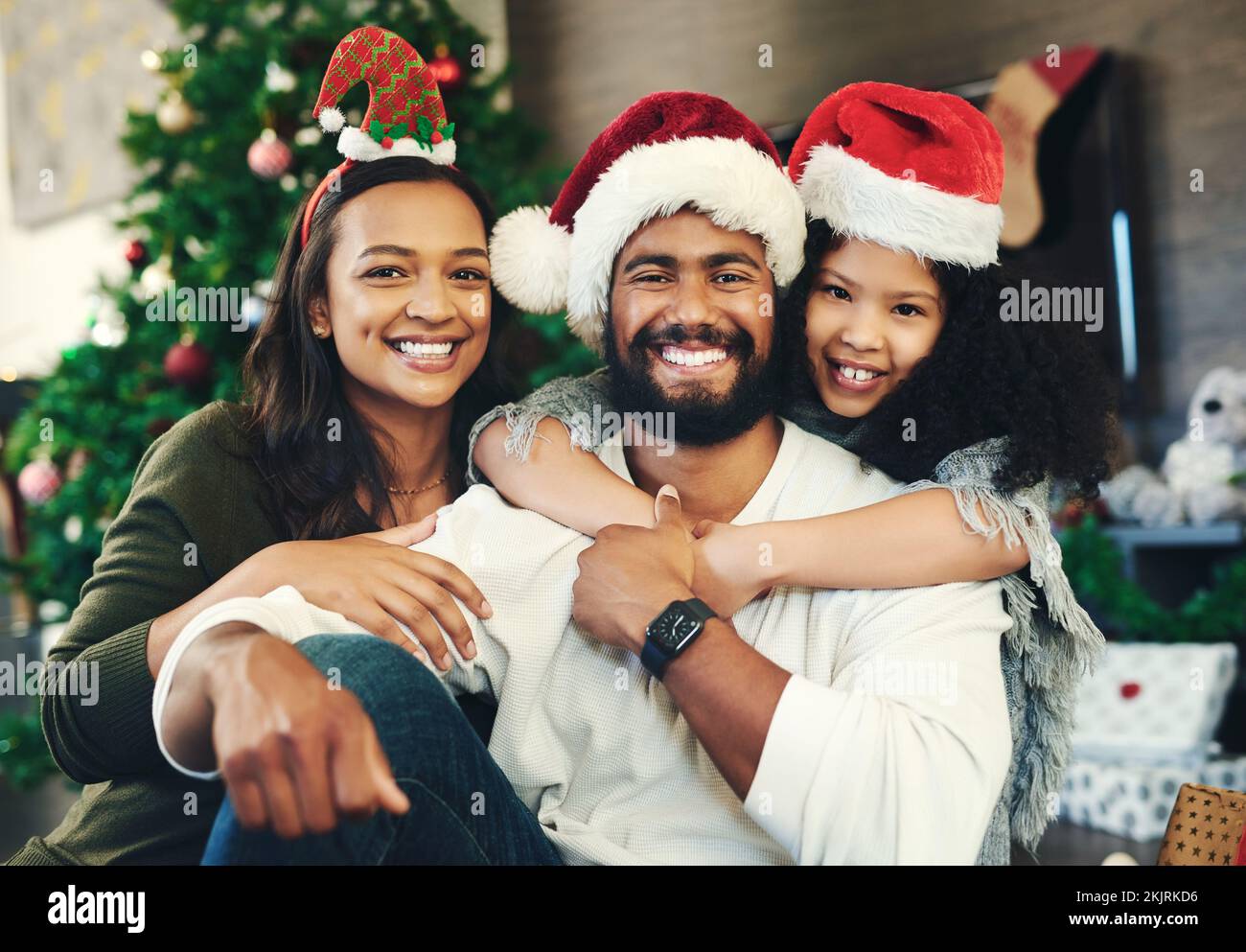 Christmas, happy and portrait of family in living room for celebration ...