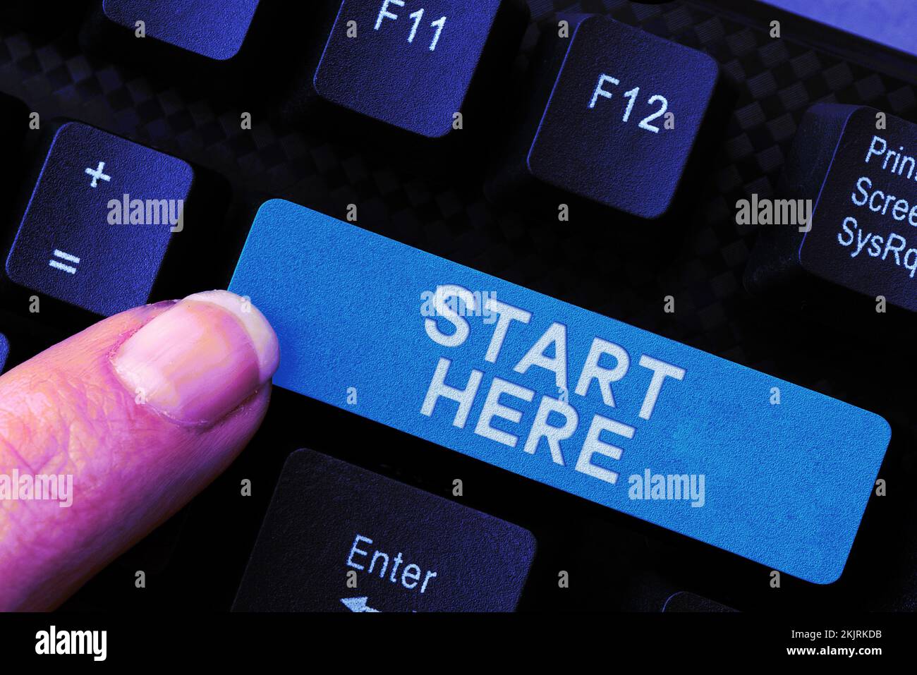 Hand writing sign Start Here. Word Written on telling someone this is ...