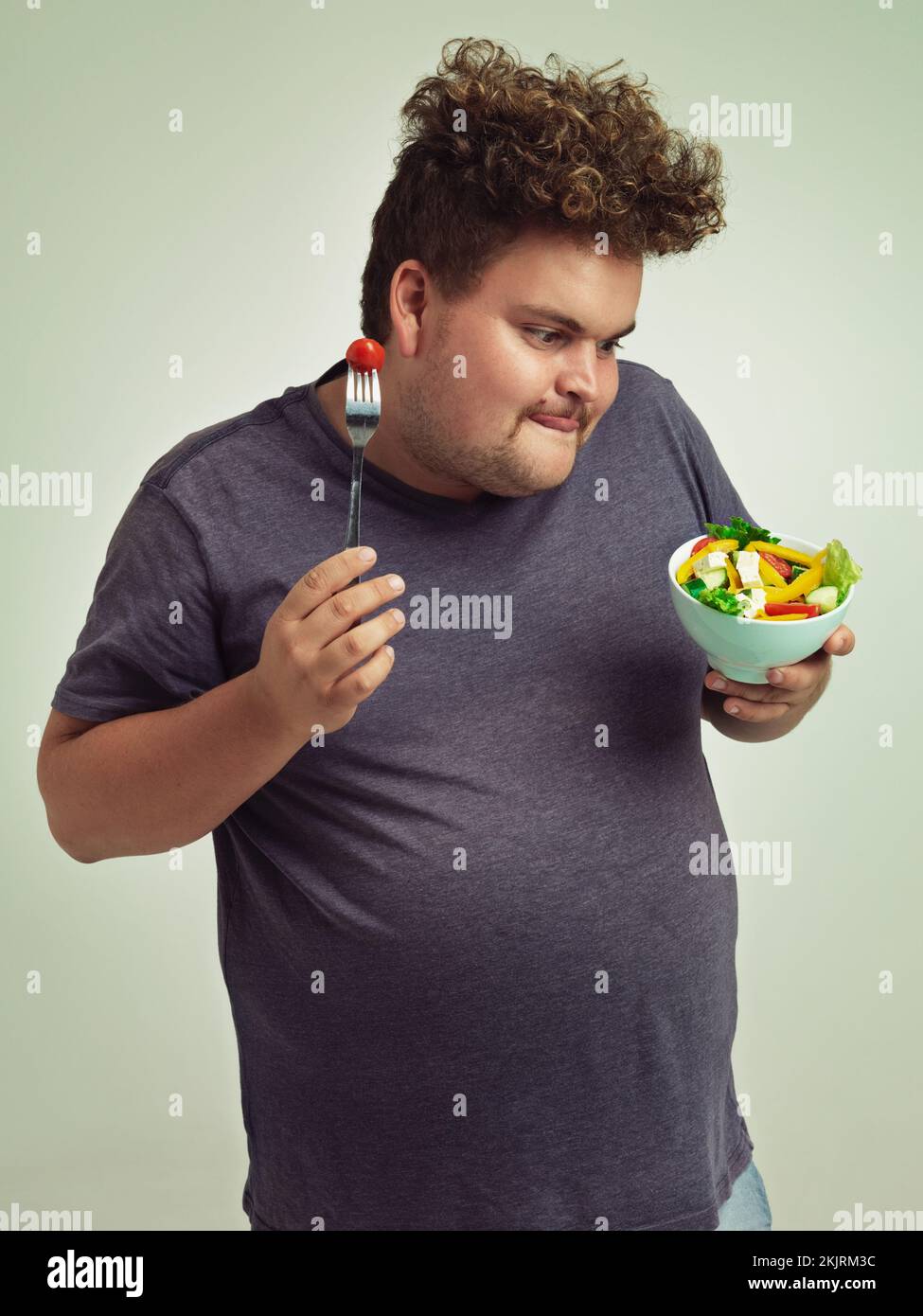 Young overweight man bowl hi-res stock photography and images - Alamy