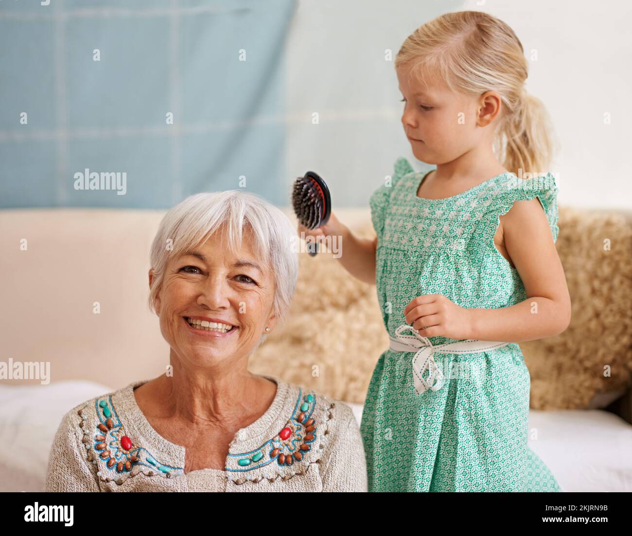 Brushing blonde hair hi-res stock photography and images - Alamy