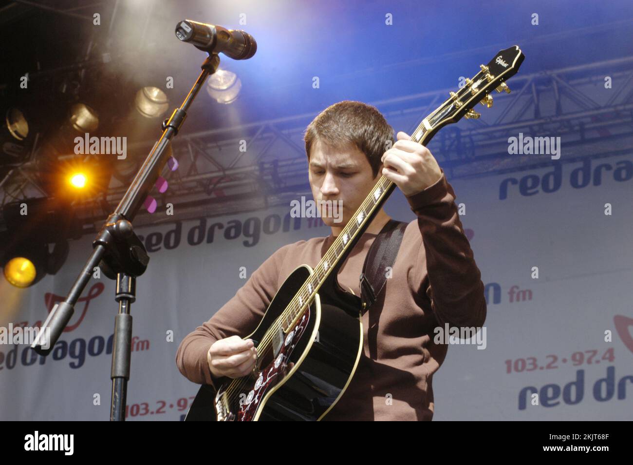 Mark Joseph plays an Epiphone semi acoustic guitar at The Big Weekend ...