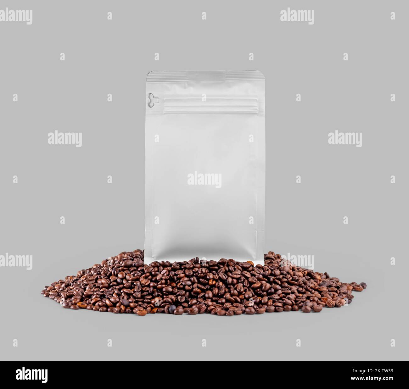 Mockup of white doy pack, zip gusset packaging on coffee beans, close ...