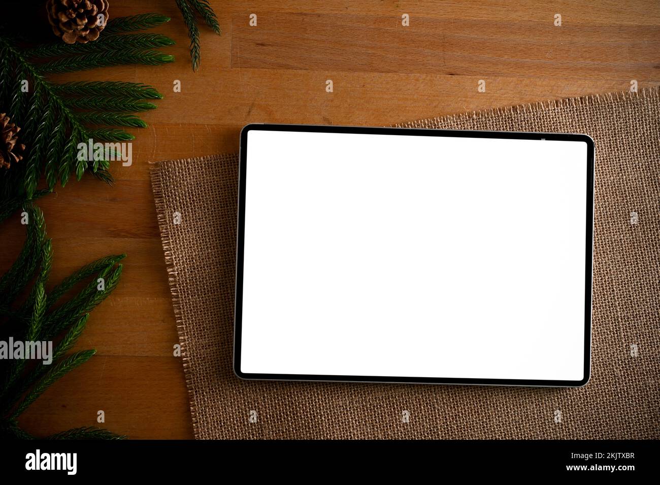 Top view, A digital tablet white screen mockup for display your graphic ...
