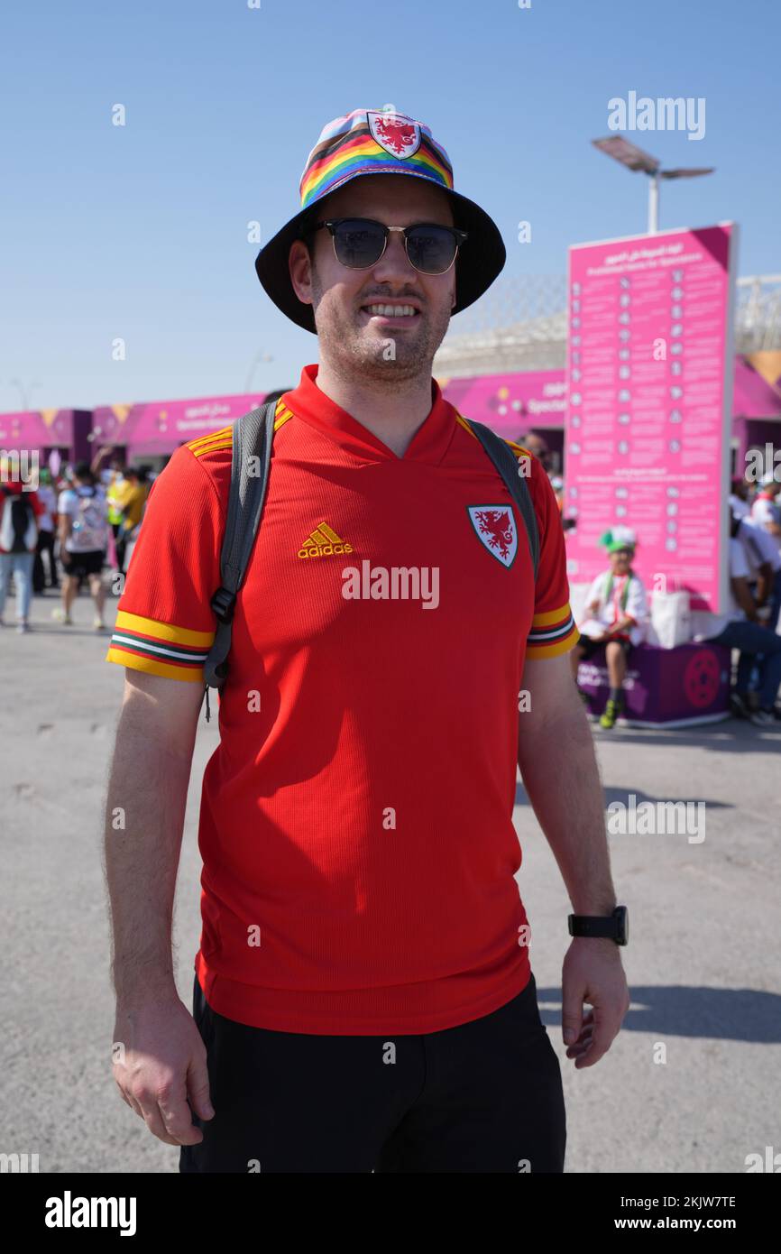 A Welsh fan pose for a photo at the Khalifa International Stadium, Doha ...