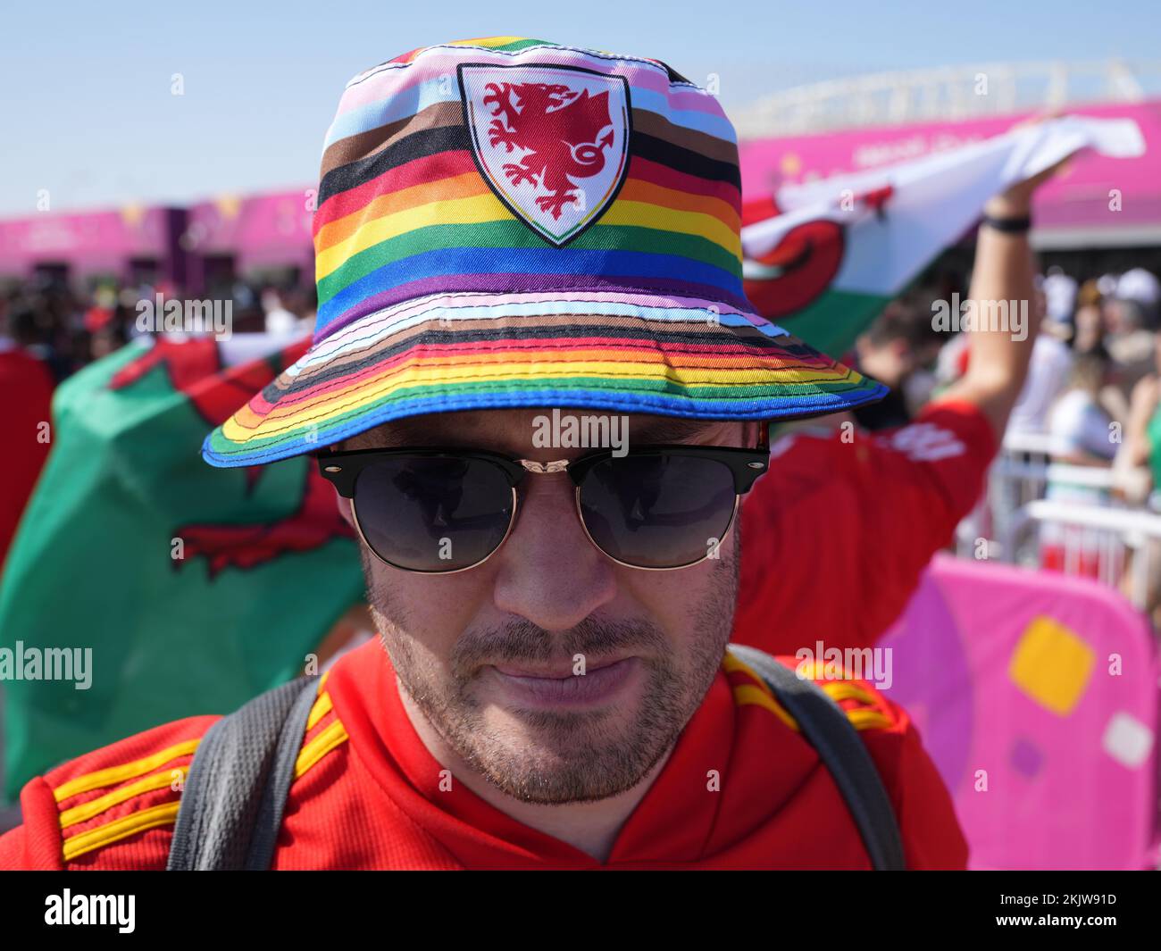 A Welsh fan pose for a photo at the Khalifa International Stadium, Doha ...