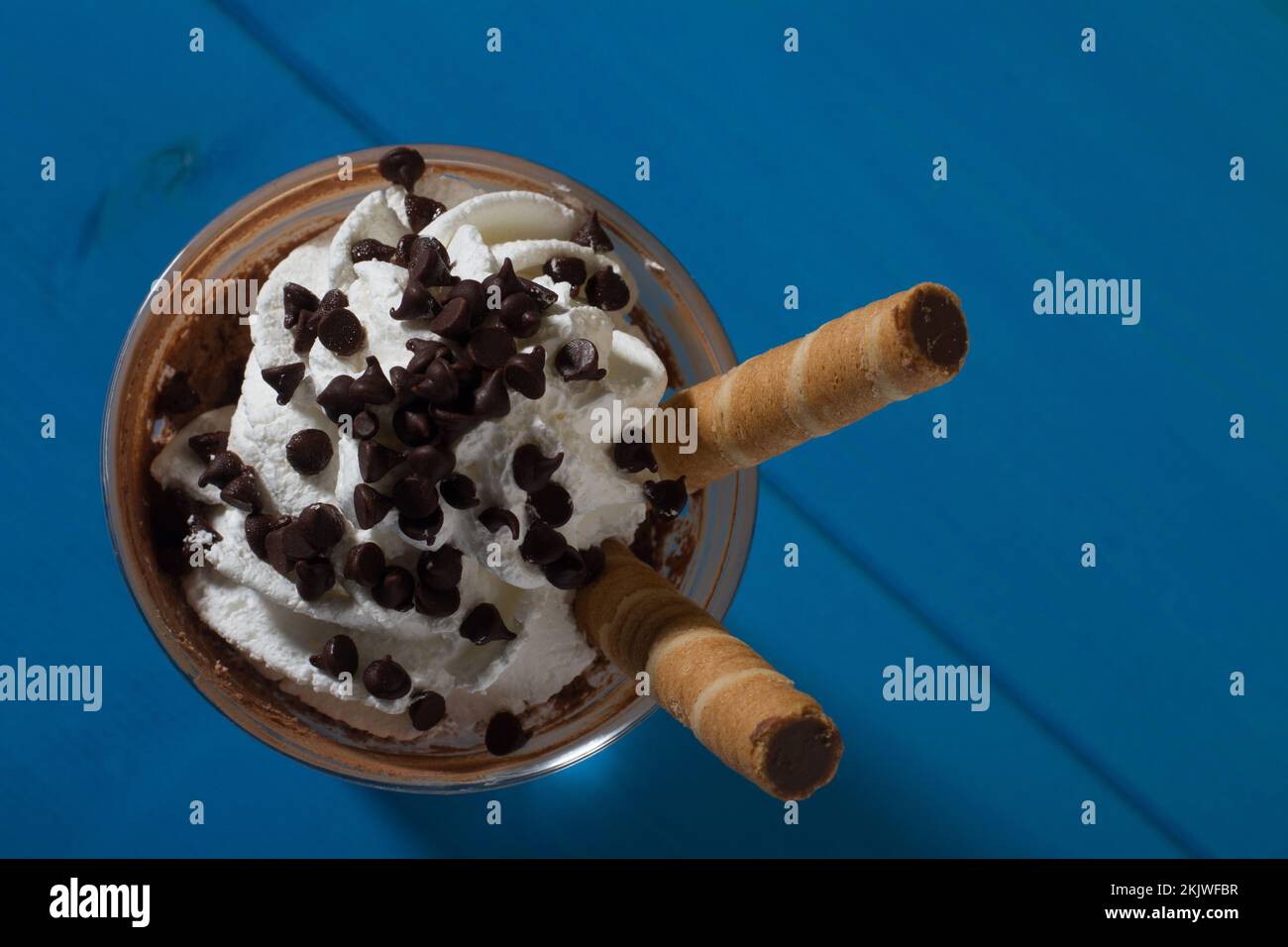 A top view of a delicious glass of chocolate milkshake with whipped ...