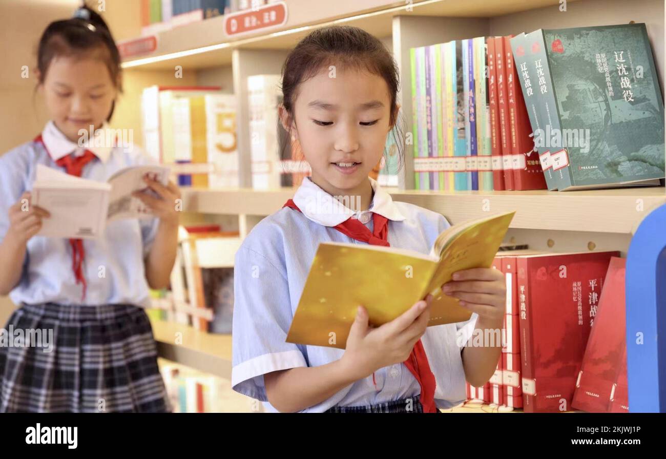 The library in Fengxi School is 1,800 square meters including 13 ...