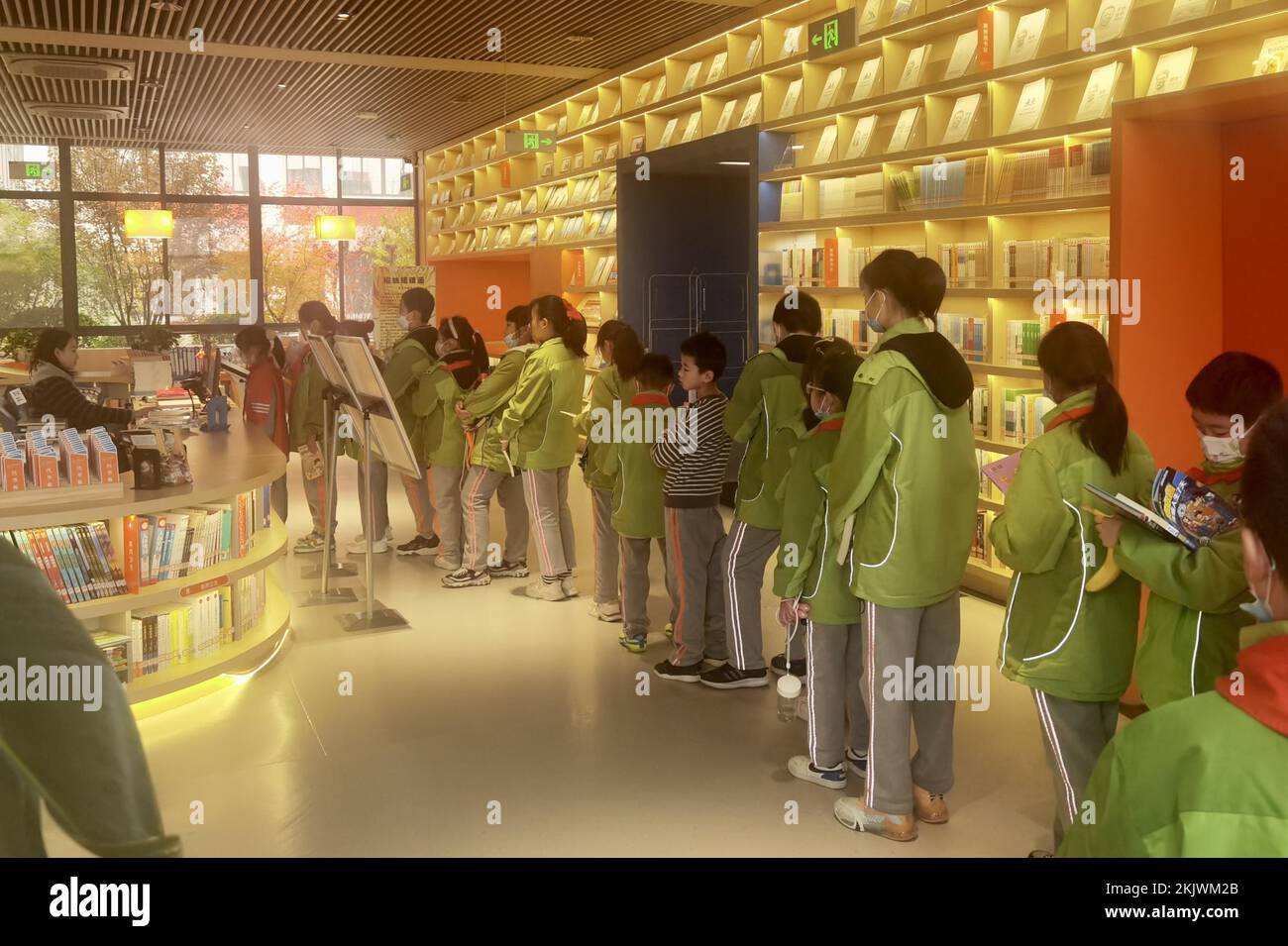 The library in Fengxi School is 1,800 square meters including 13 ...
