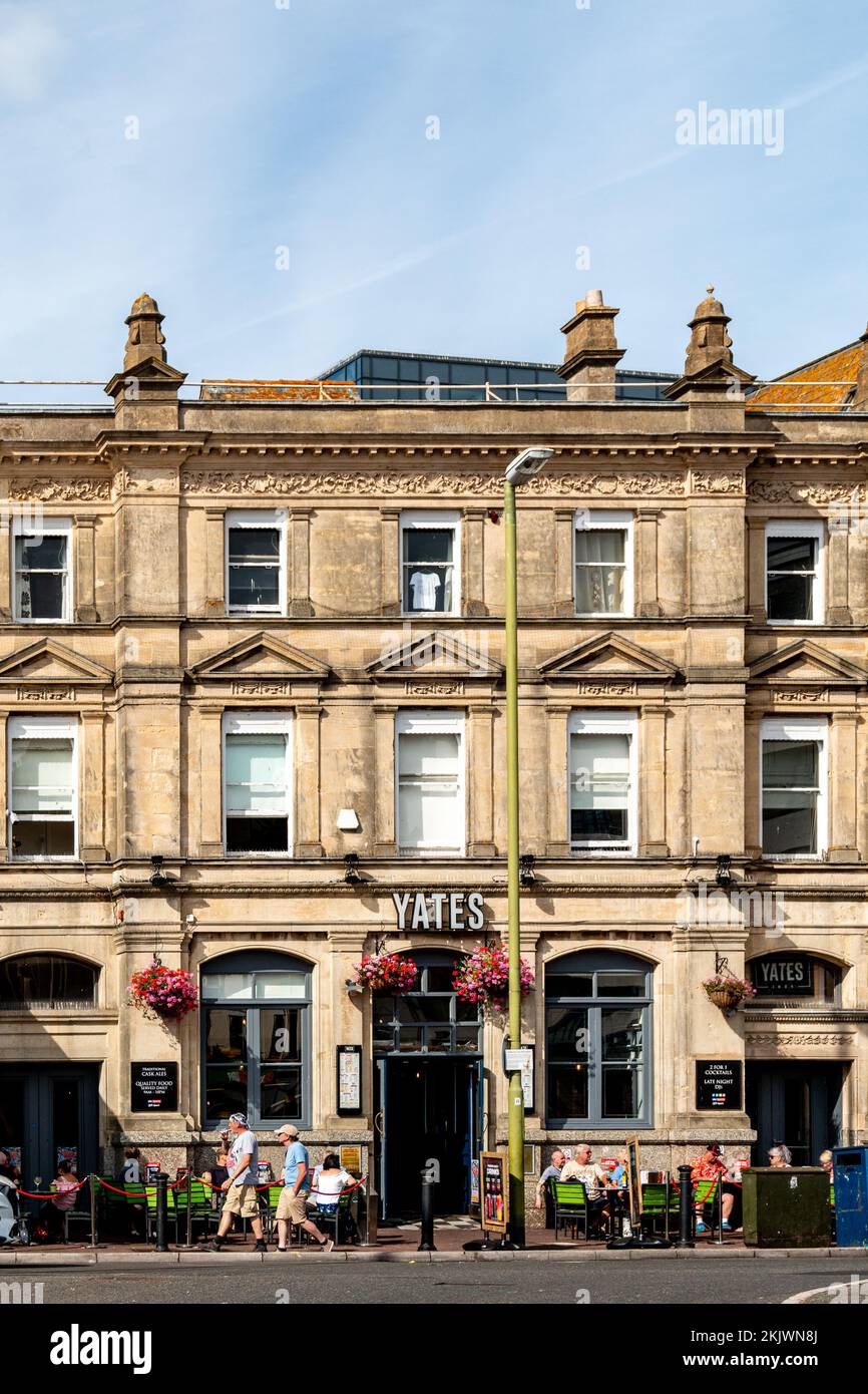 An external view of Yates, a bar, in Torquay, Devon, UK Stock Photo - Alamy
