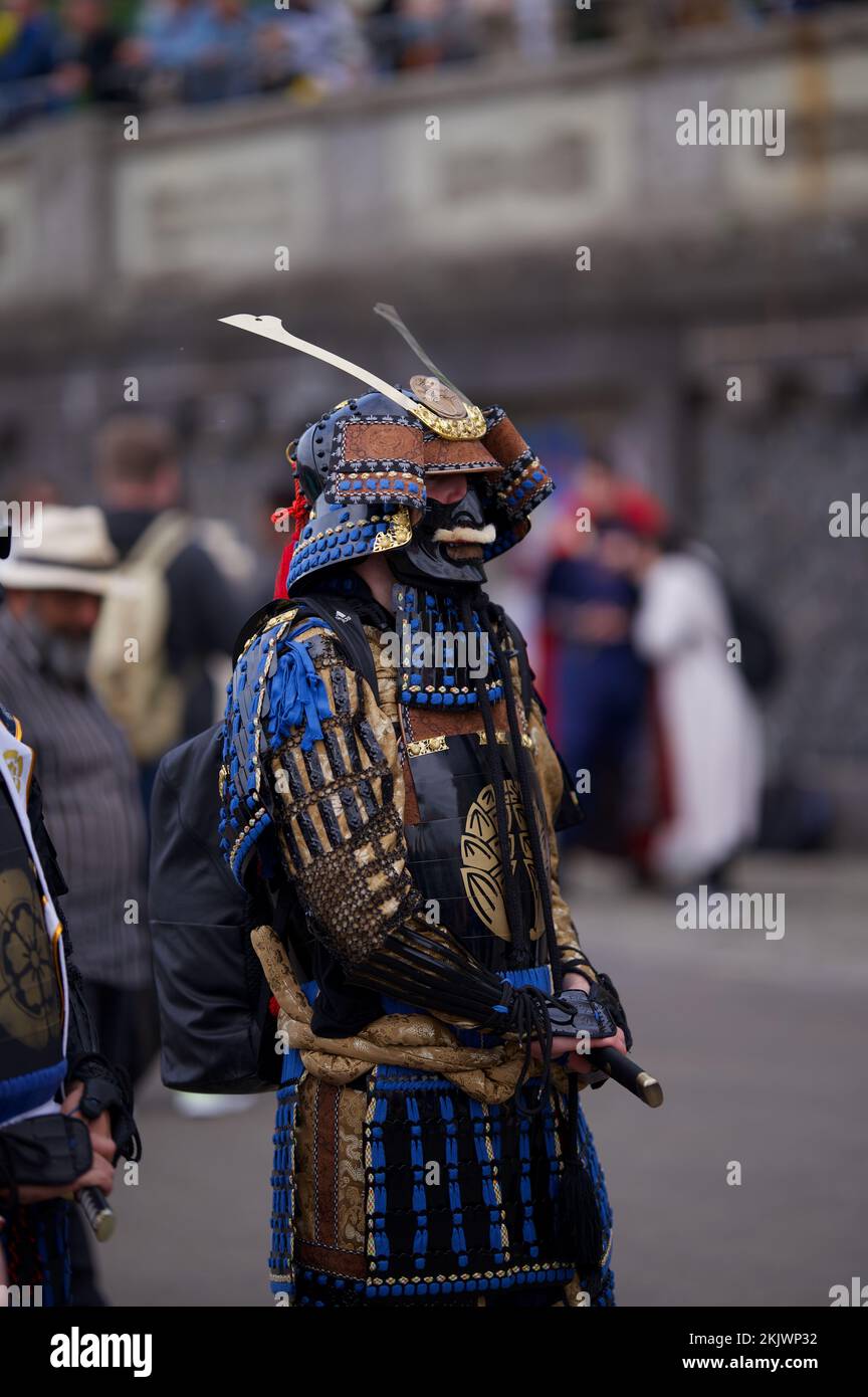 A vertical shot of a person dressed as a samurai during Japan Day ...