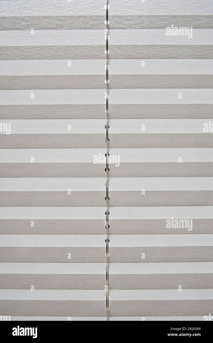 White striped textile blinder for window. Vertical background texture ...