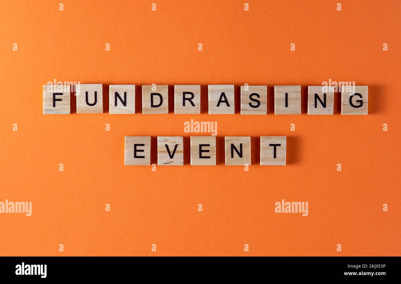 Fundrasing event word phrase in wooden letters. Motivation and slogan ...