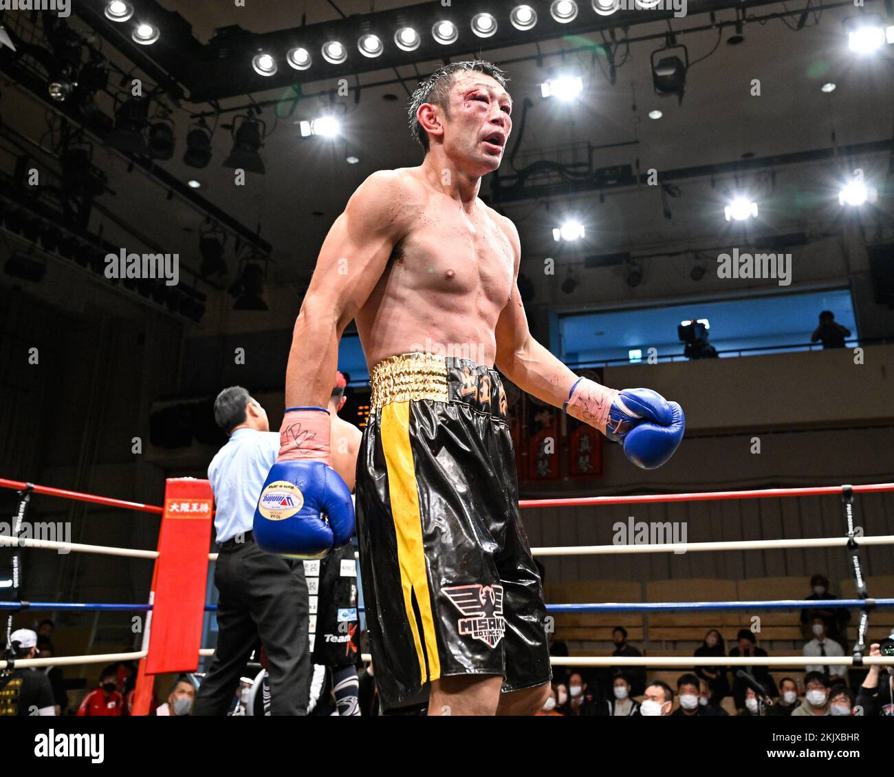 Referee Takeru Okaniwa stops the fight in the ninghth round during the ...