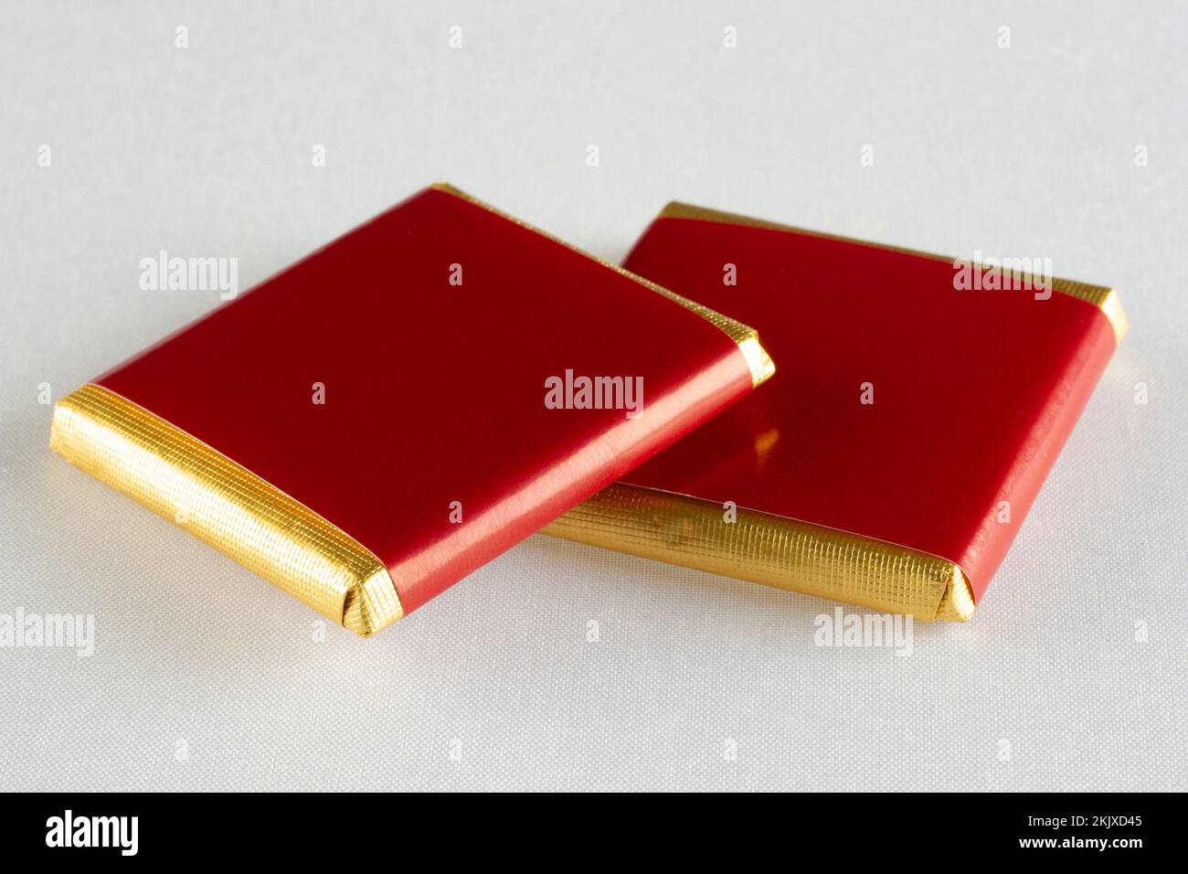 Packed square milk chocolate. Studio shoot Stock Photo - Alamy