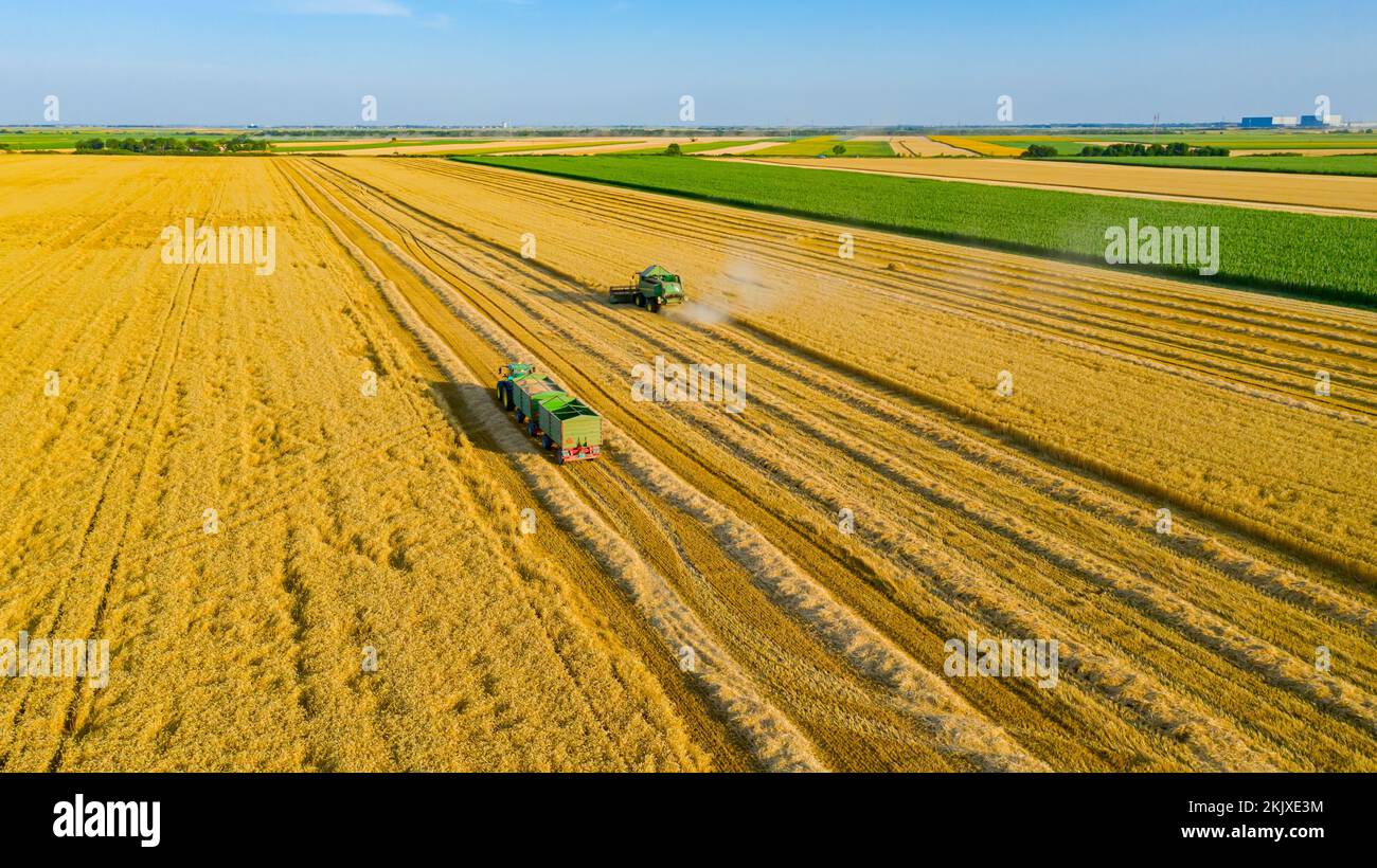 Aerial view on tractor two trailers taking position for transshipment ...