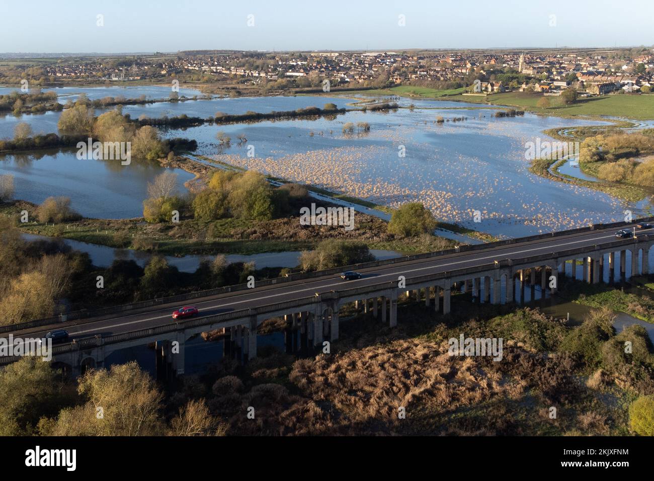 Cars pass over the River Nene in Irthlingborough, Northamptonshire ...
