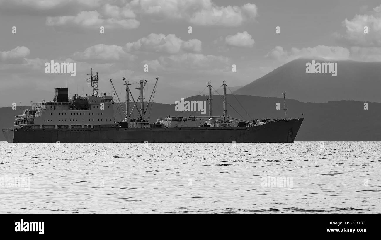 The fishing boat in gray morning on Pacific ocean off the coast of the ...