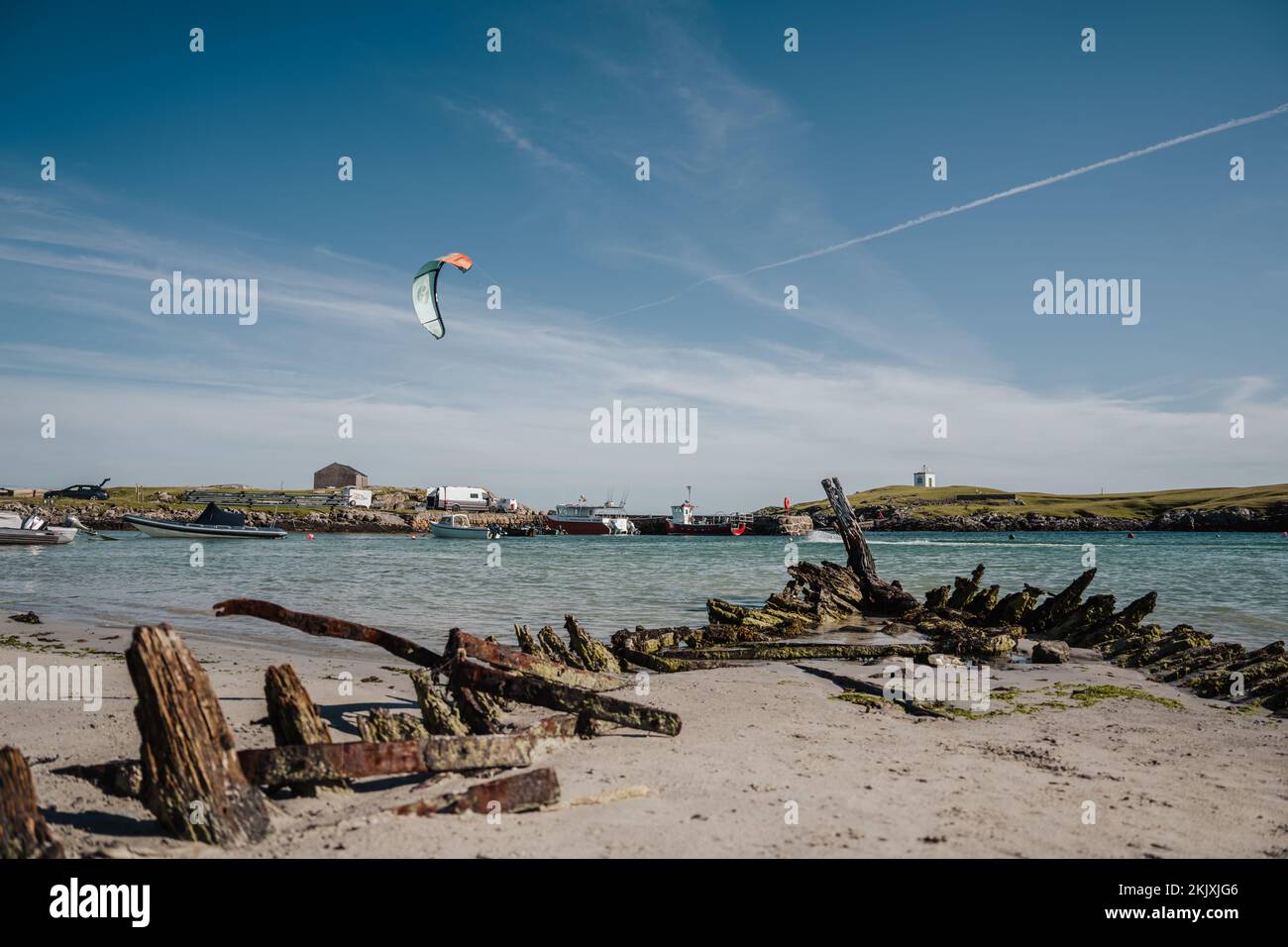 The view of a Kitesurfer under the blue sky in the Isle of Tiree Stock ...