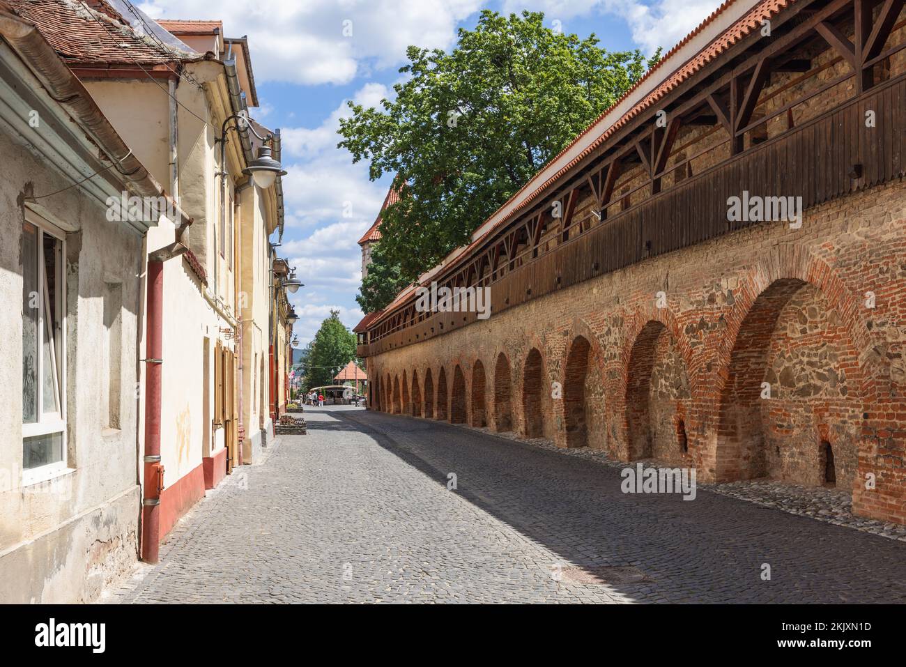 Sections of the medieval thick brick wall still guard historic area ...