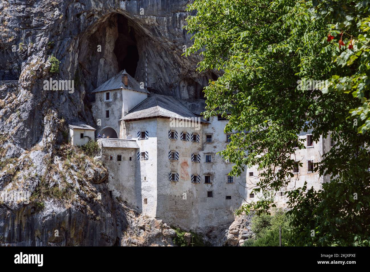 Unique medieval Predjama Castle (Predjamski grad) was built under a ...