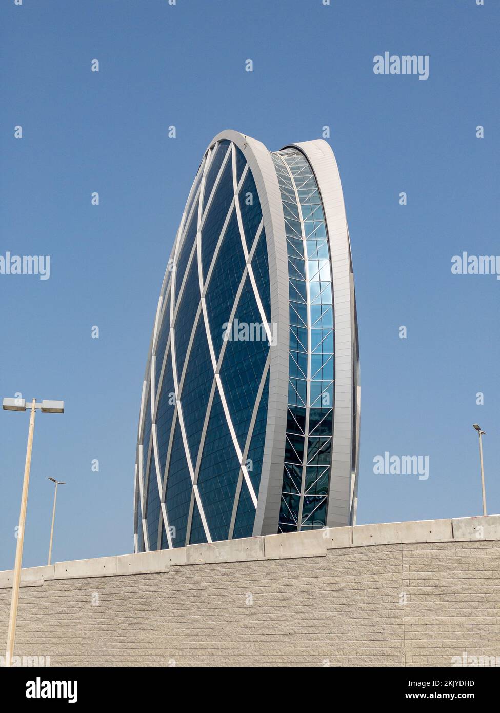 Aldar Head Quarters Building in Abu Dhabi the shape of a disk with a ...