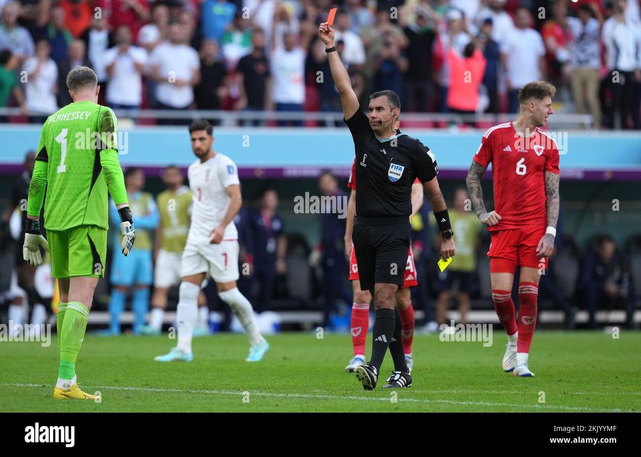 Wales goalkeeper Wayne Hennessey is shown a red card by referee Mario ...