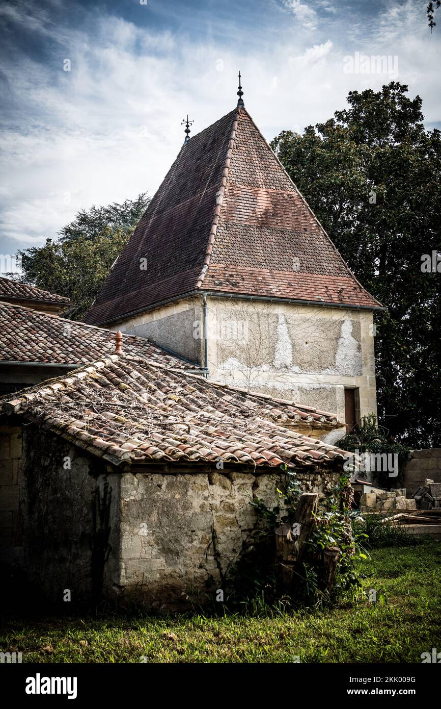 Old terracotta roof tiles in need of restoration & renovation on an old ...