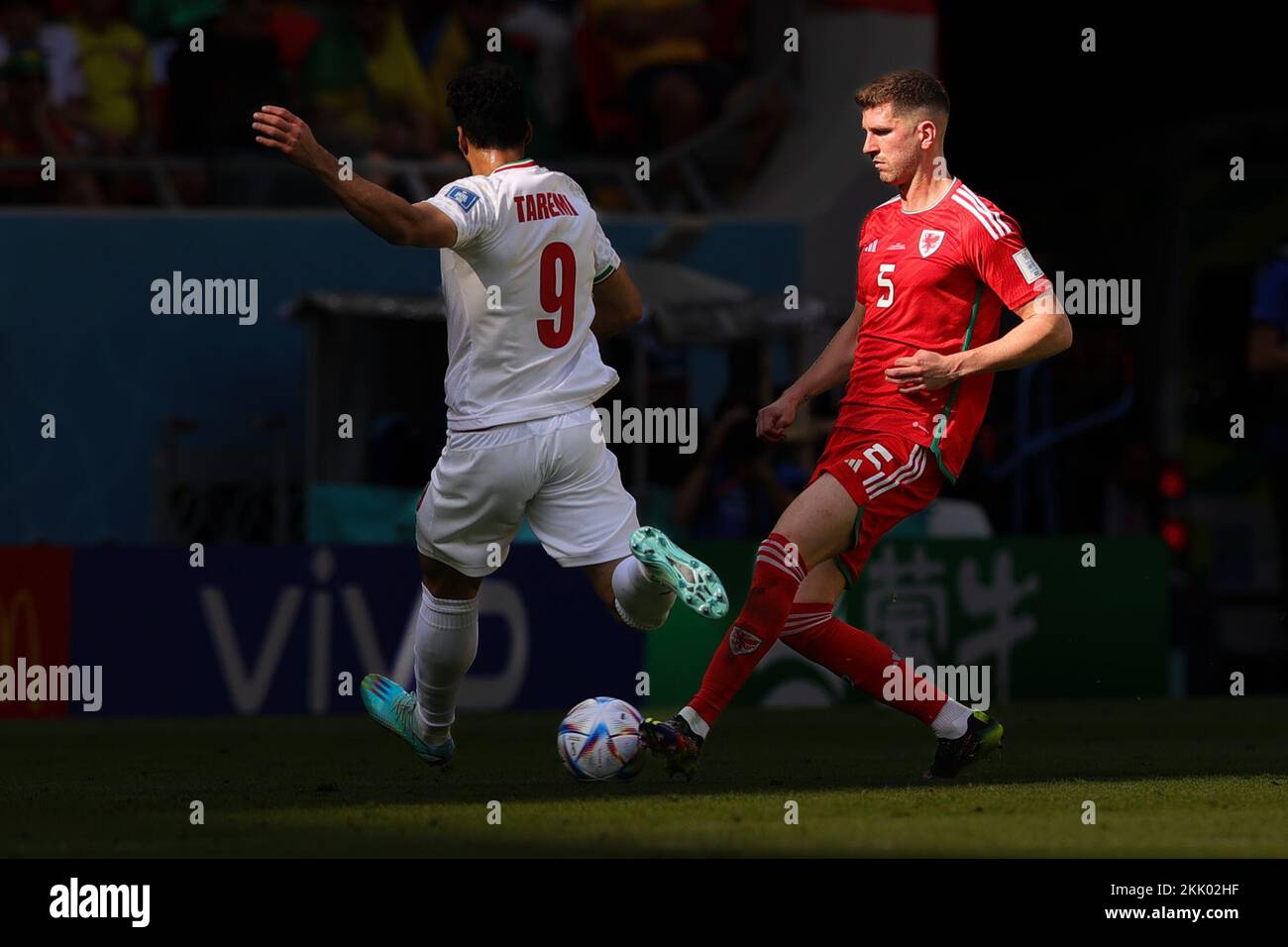 Doha, Qatar. 25th Nov, 2022. Chris Mepham of Wales passes the ball ...