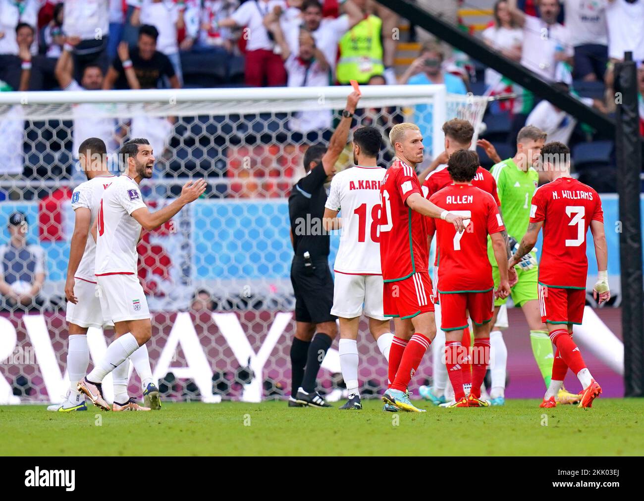 Wales goalkeeper Wayne Hennessey recieves a red card for a foul on Iran ...