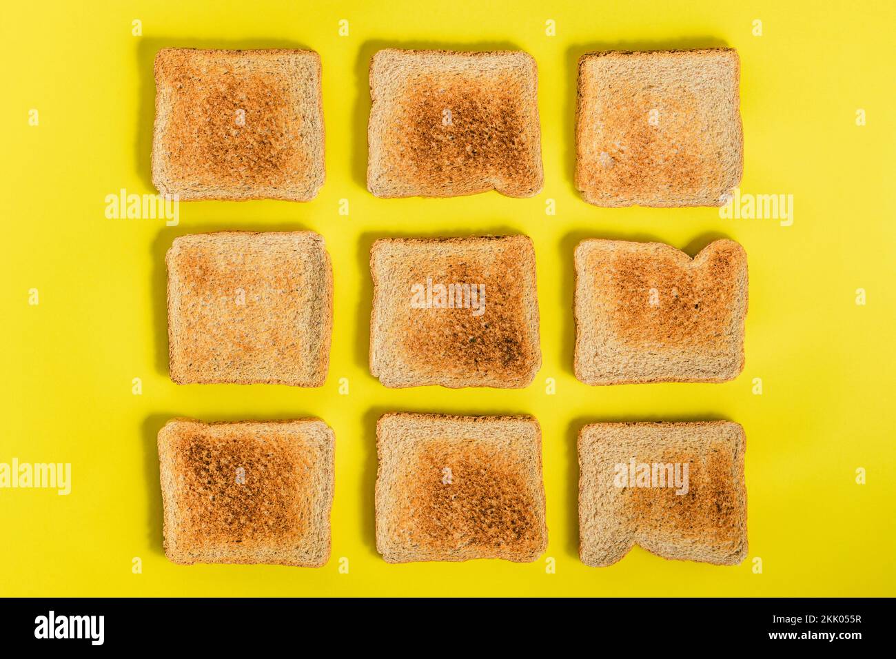 Top view of a pattern of several slices of toasted bread arranged on ...