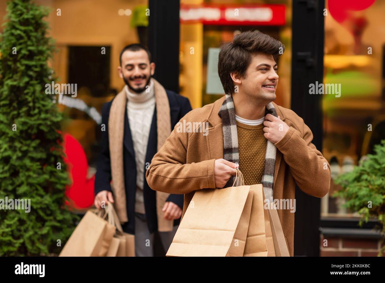 Man shopping bags smiling hi-res stock photography and images - Alamy