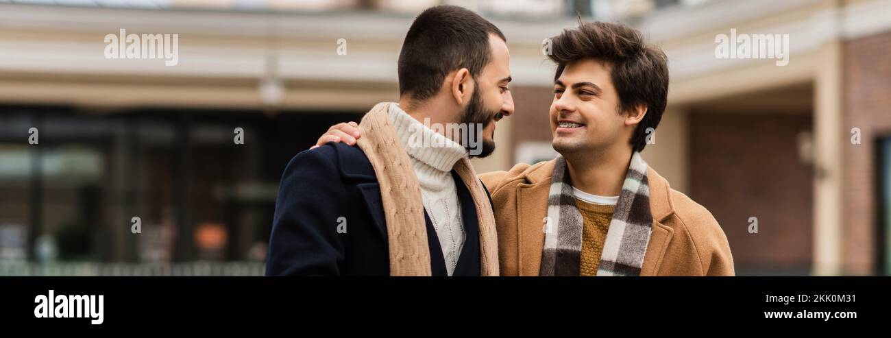 Happy gay couple looking other hi-res stock photography and images - Alamy