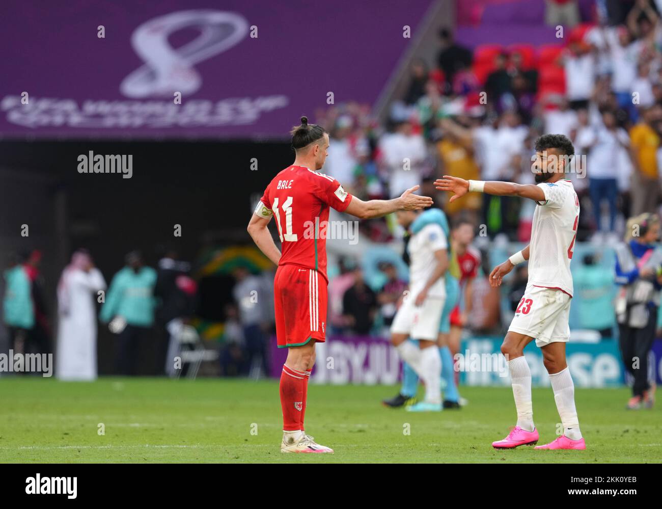 Wales' Gareth Bale (left) and Iran's Ramin Rezaeian react after the ...