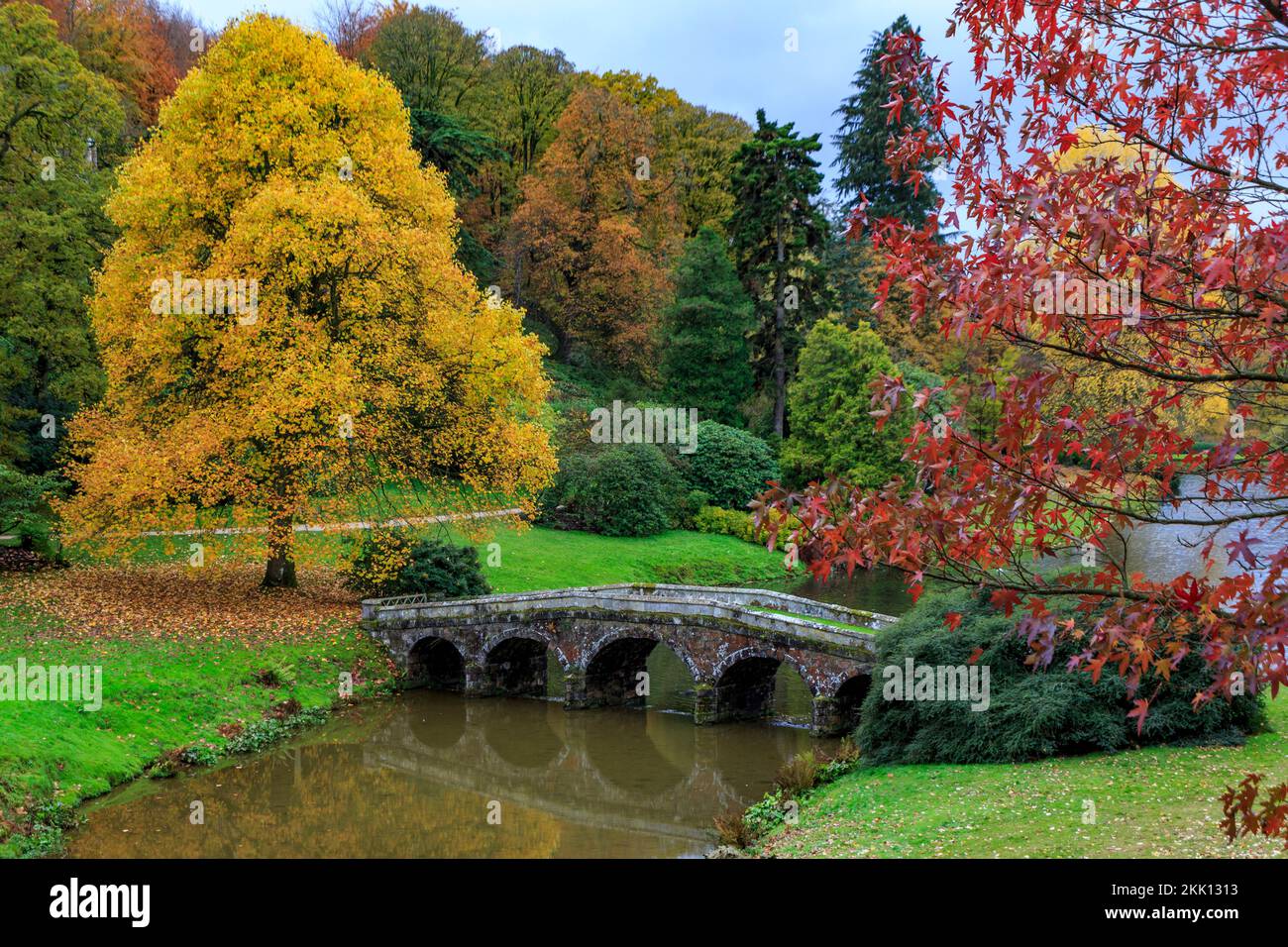 Spectacular autumn colour surrounds the historic Palladian bridge at ...