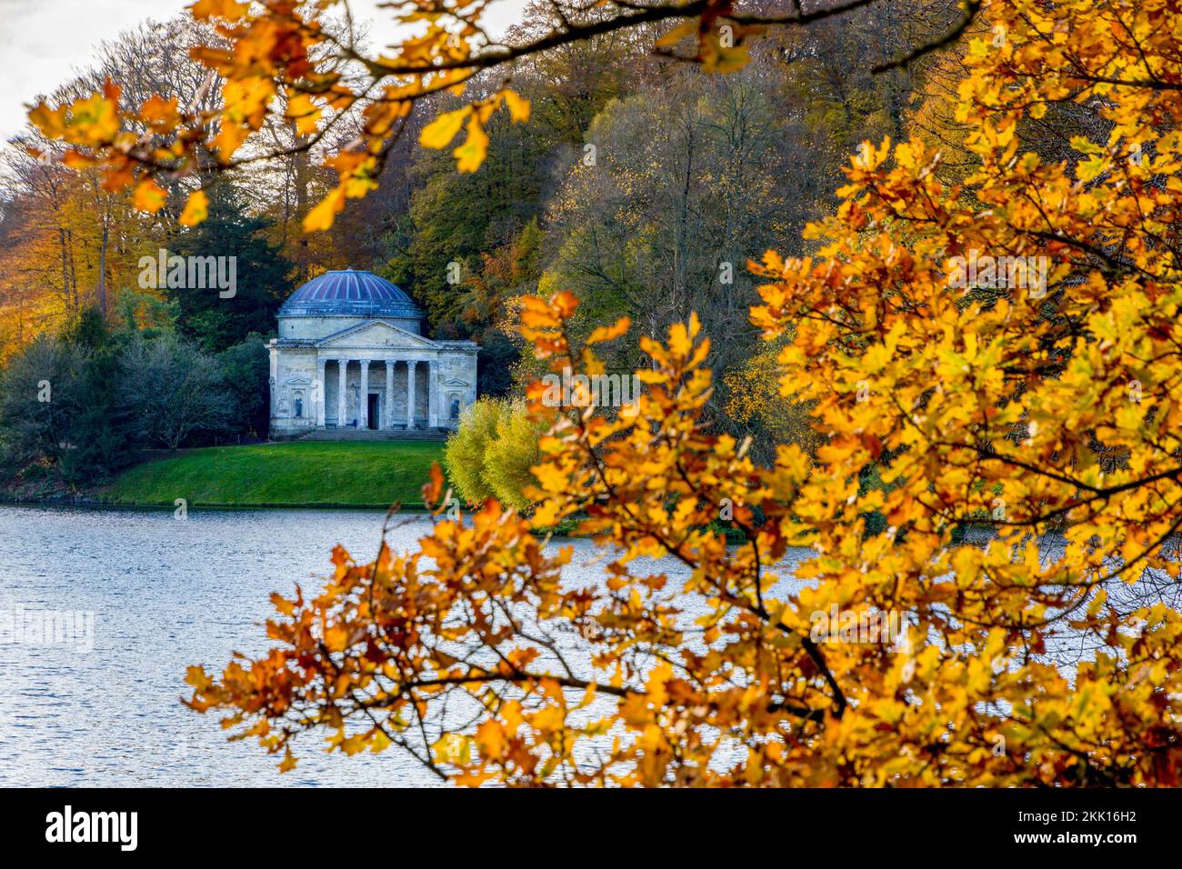Spectacular aututmn colour surrounds the Pantheon beside the lake at ...