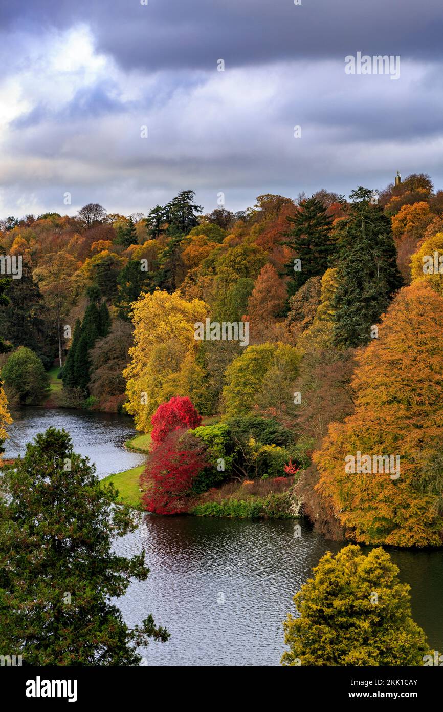 Spectacular autumn colour on the trees surrounding the lake at ...