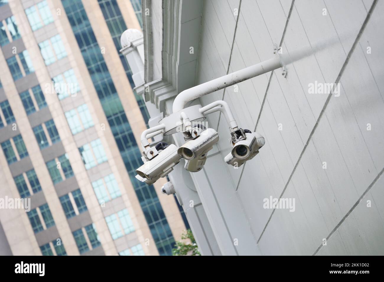 CCTV Cameras hanging on the wall Stock Photo - Alamy