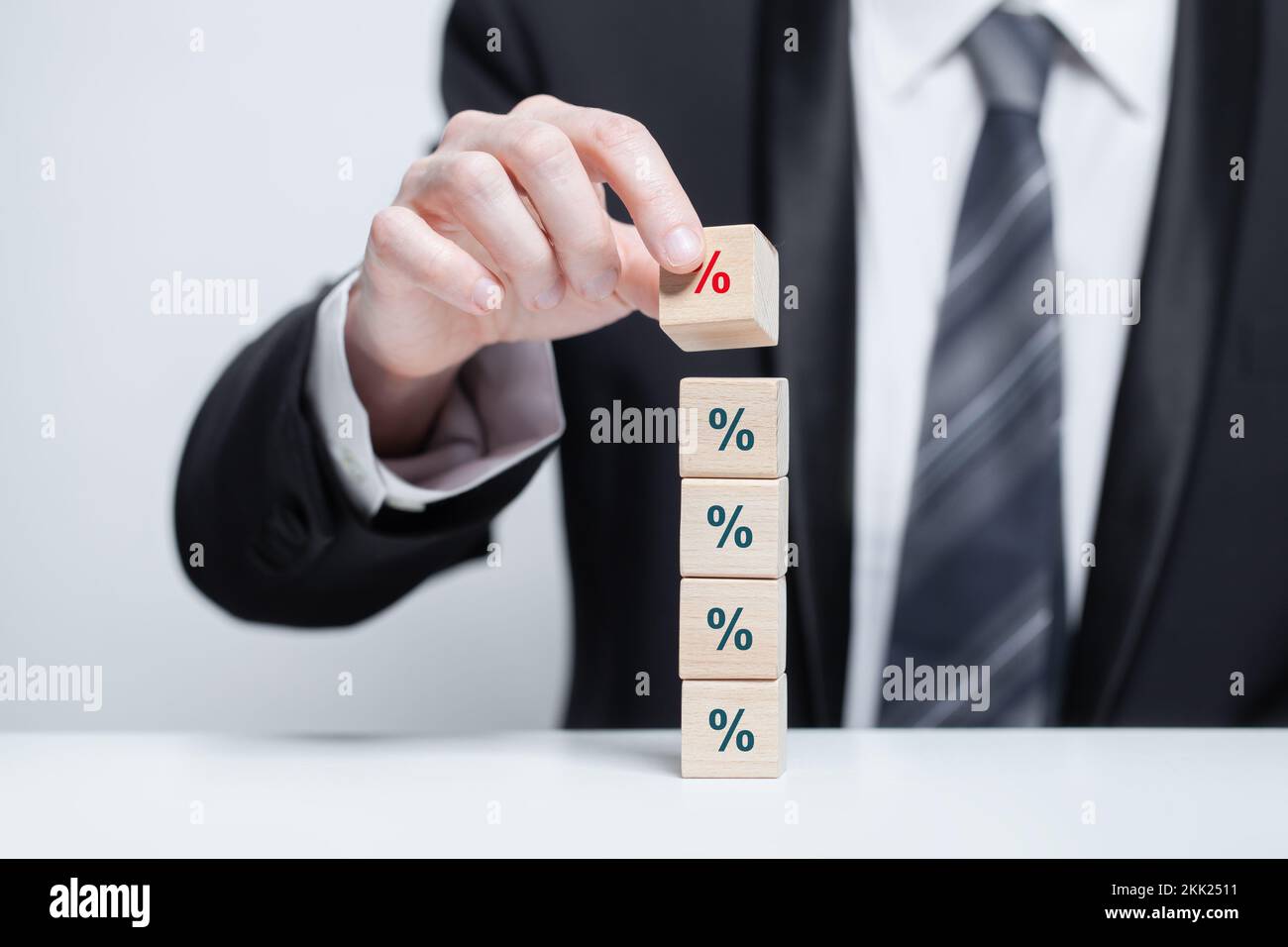 Wooden blocks with green percent signs, pyramid, business percentage ...