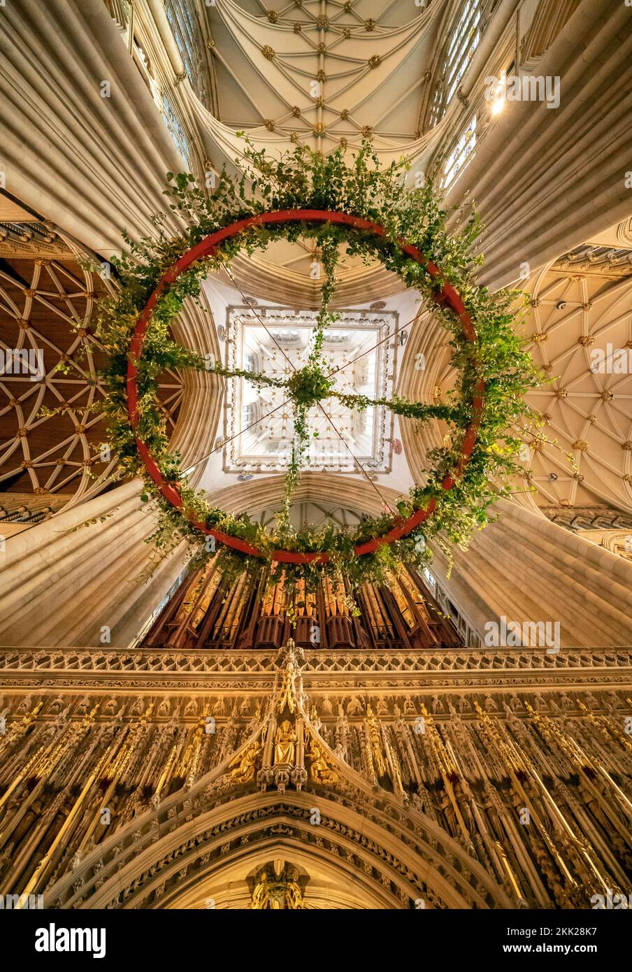 The Advent wreath is raised to its traditional position below the ...