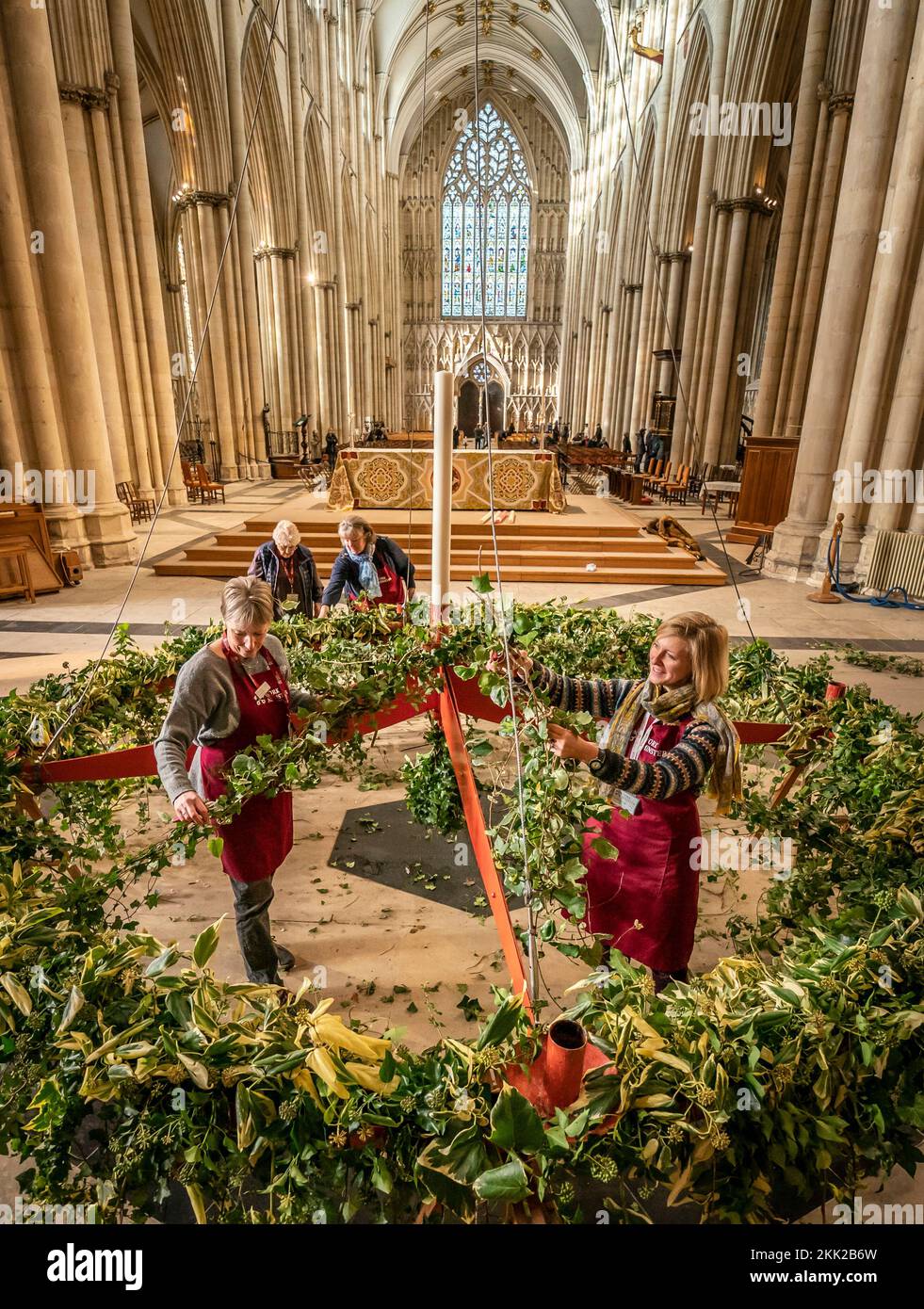 Finishing touches are made to the Advent wreath before it is raised to ...
