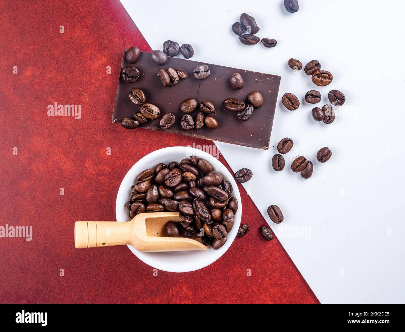 flat lay view dark chocolate with rich dark roasted coffee beans on a ...