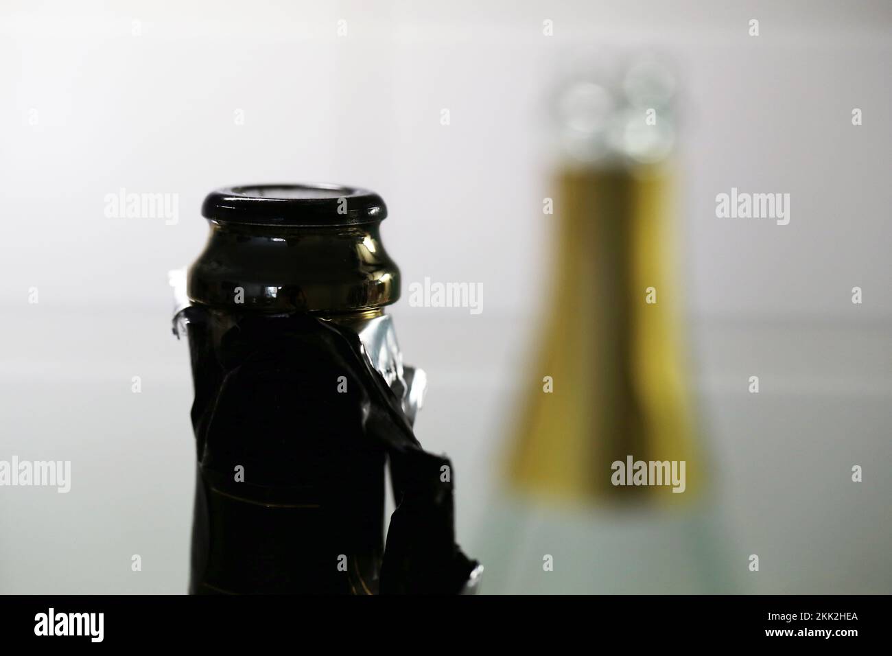 Empty sparkling wine and champagne bottles in a closeup. Situation ...
