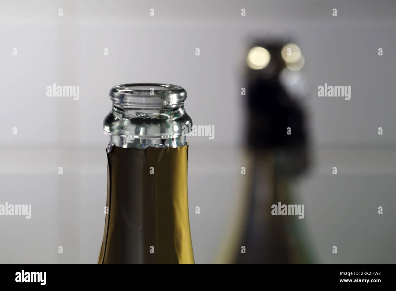 Empty sparkling wine and champagne bottles in a closeup. Situation ...