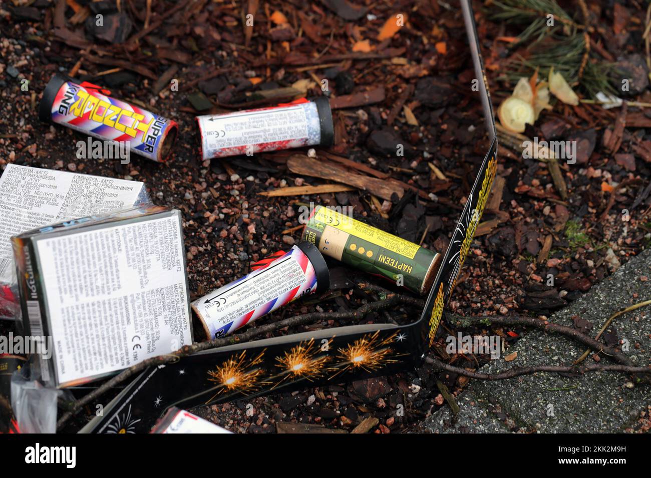 Firework trash left on the ground at New Year's Day. Colorful trash ...