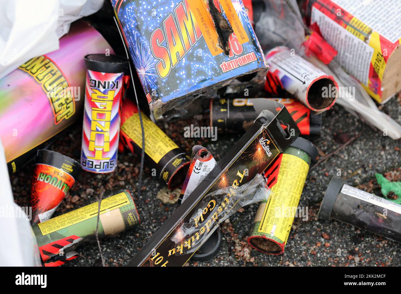 Firework trash left on the ground at New Year's Day. Colorful trash ...