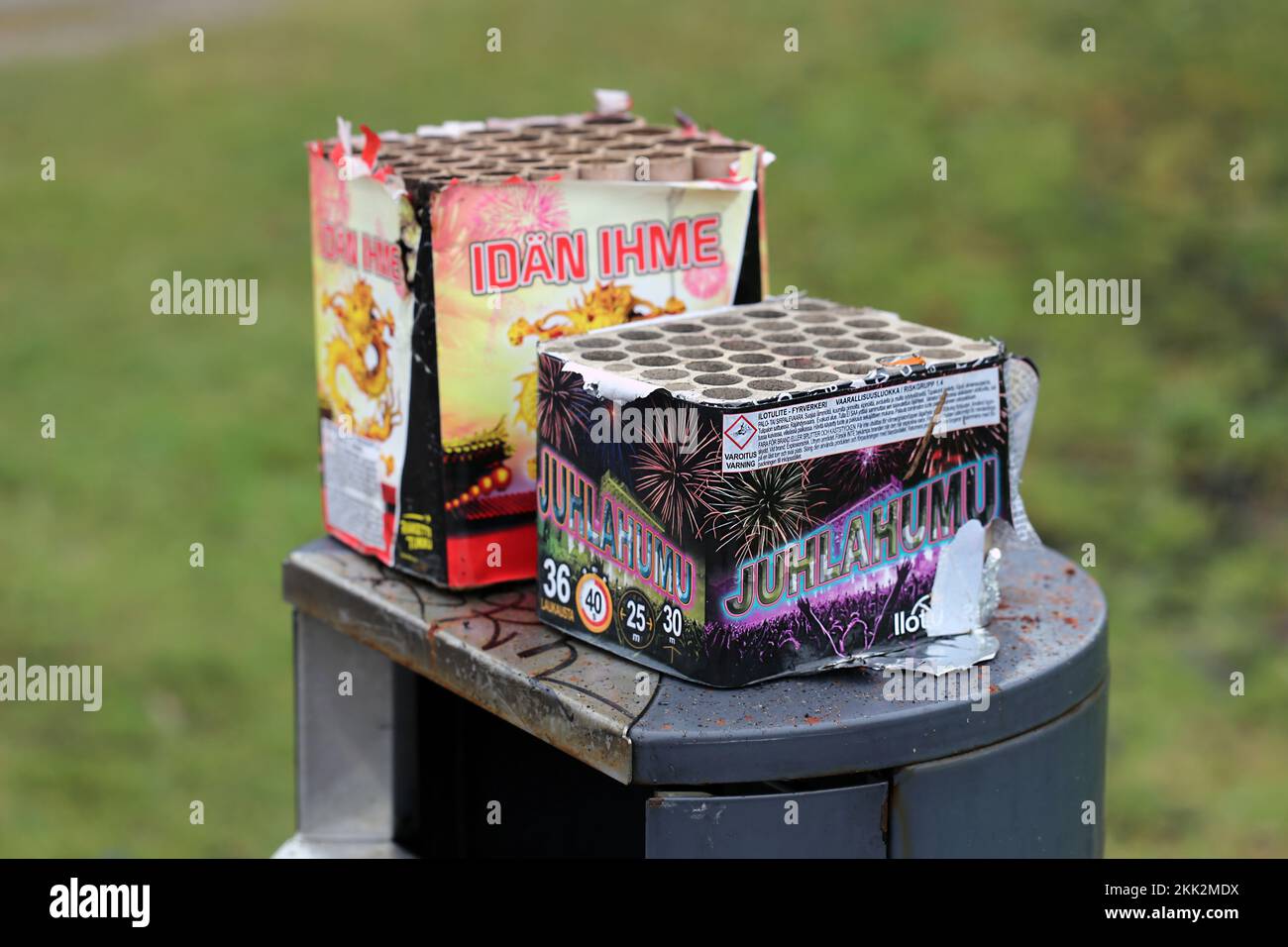 Firework trash left on the ground at New Year's Day. Colorful trash ...