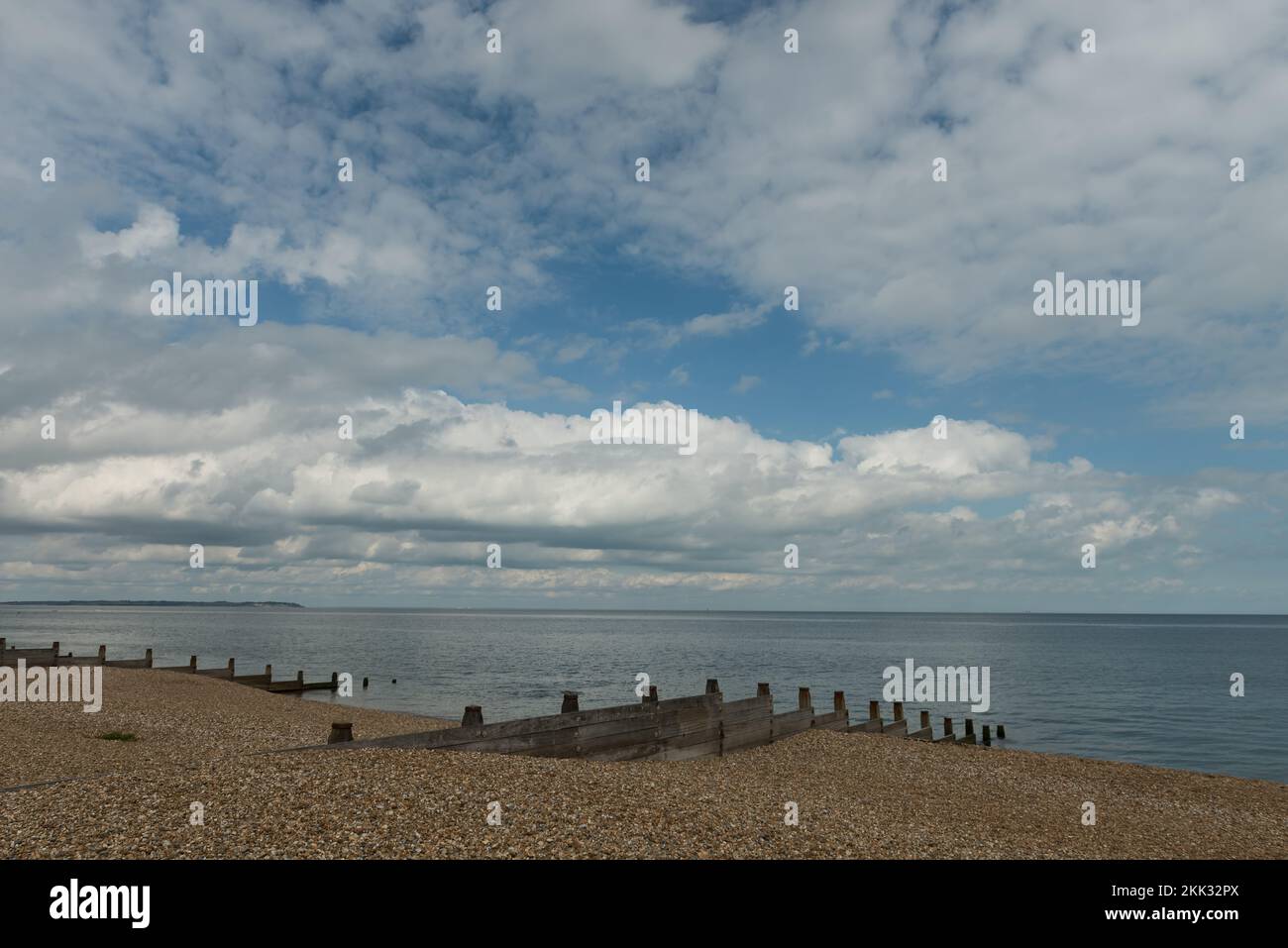 Calm water sea high tide predominates as change of low weather front ...