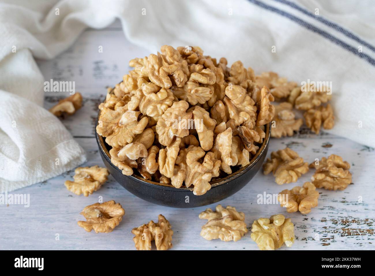 Walnut kernel on wood floor. Nuts. Healthy food. close up Stock Photo ...