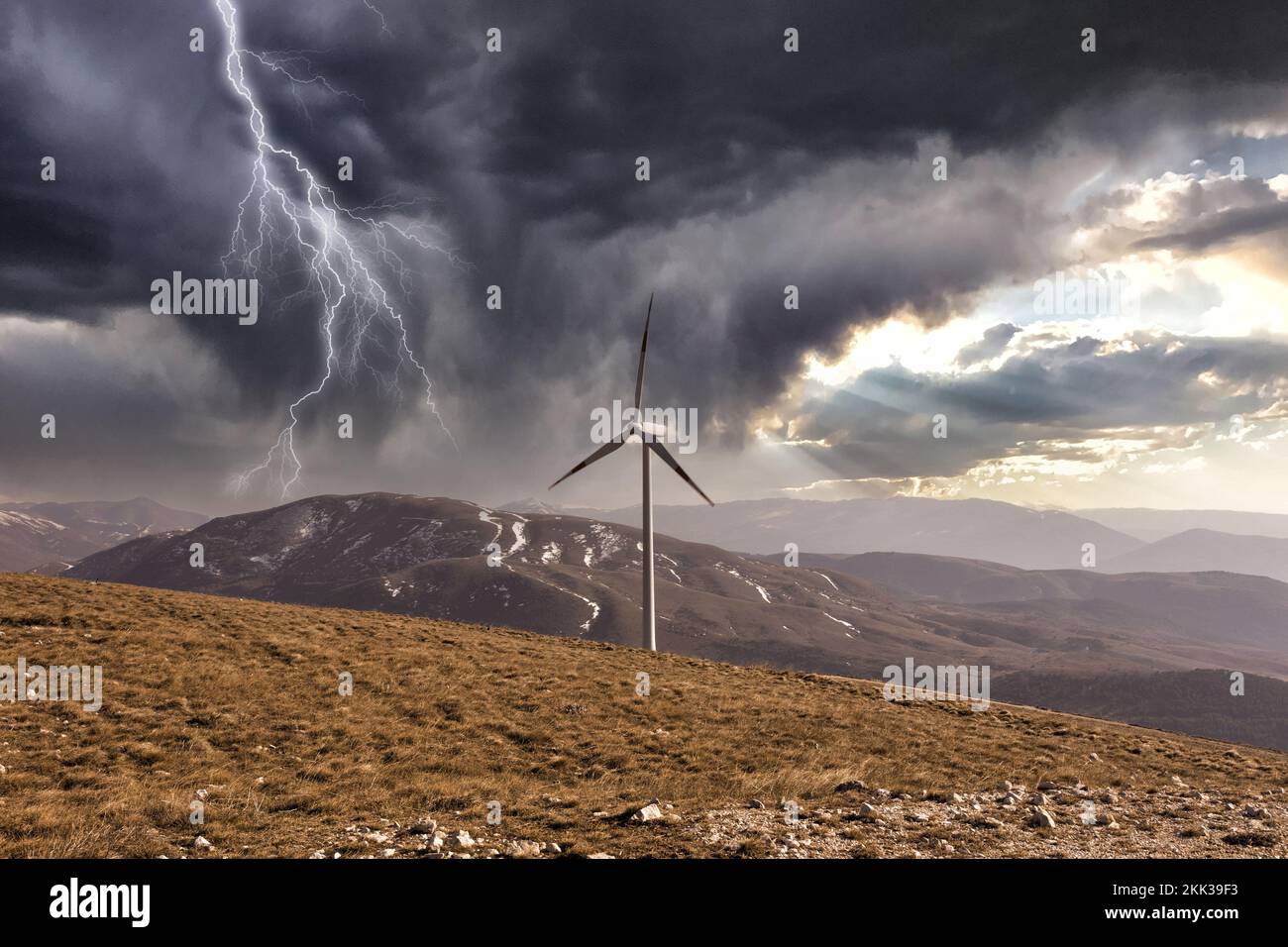 Wind turbines on a beautiful sky.A mountain wind farm. Renewable energy ...