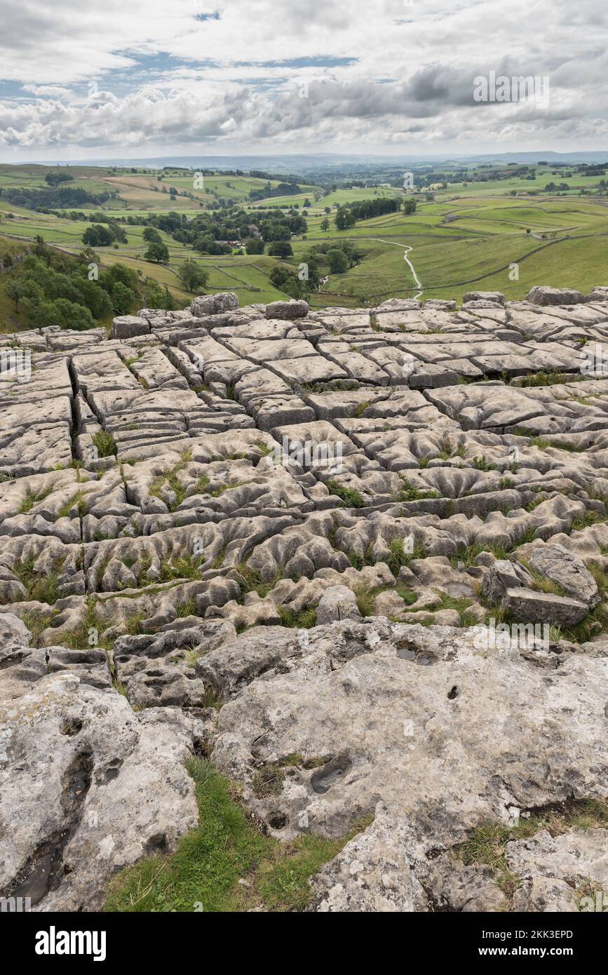 Malham Cove, a fault on the middle Craven Fault, limestone pavement on ...